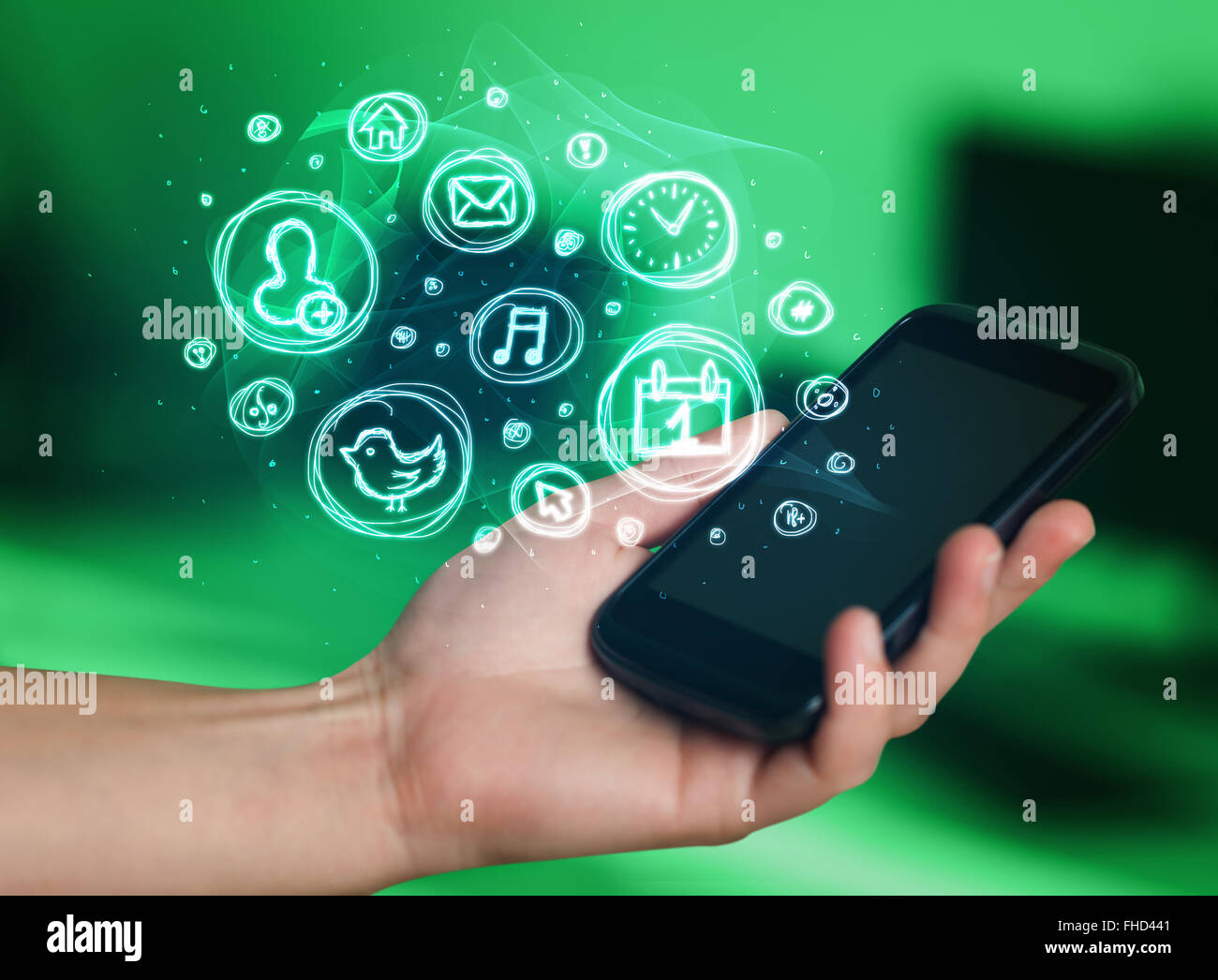 Hand holding smartphone with mobile app choices Stock Photo - Alamy