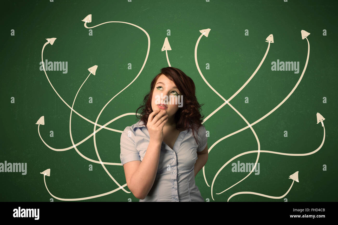 Beautiful girl thinking a solution Stock Photo - Alamy