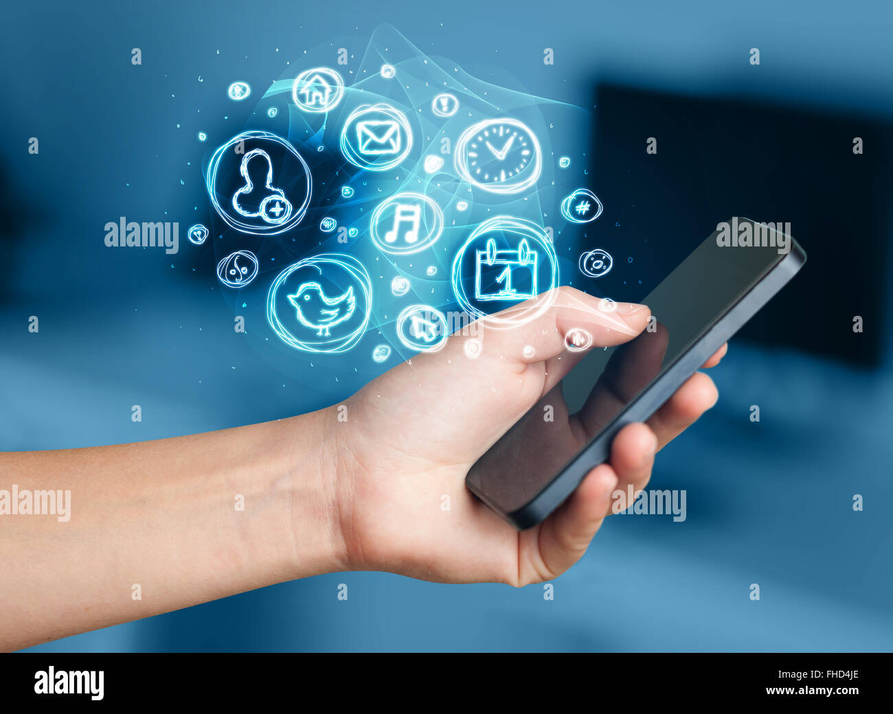 Hand holding smartphone with mobile app choices Stock Photo - Alamy