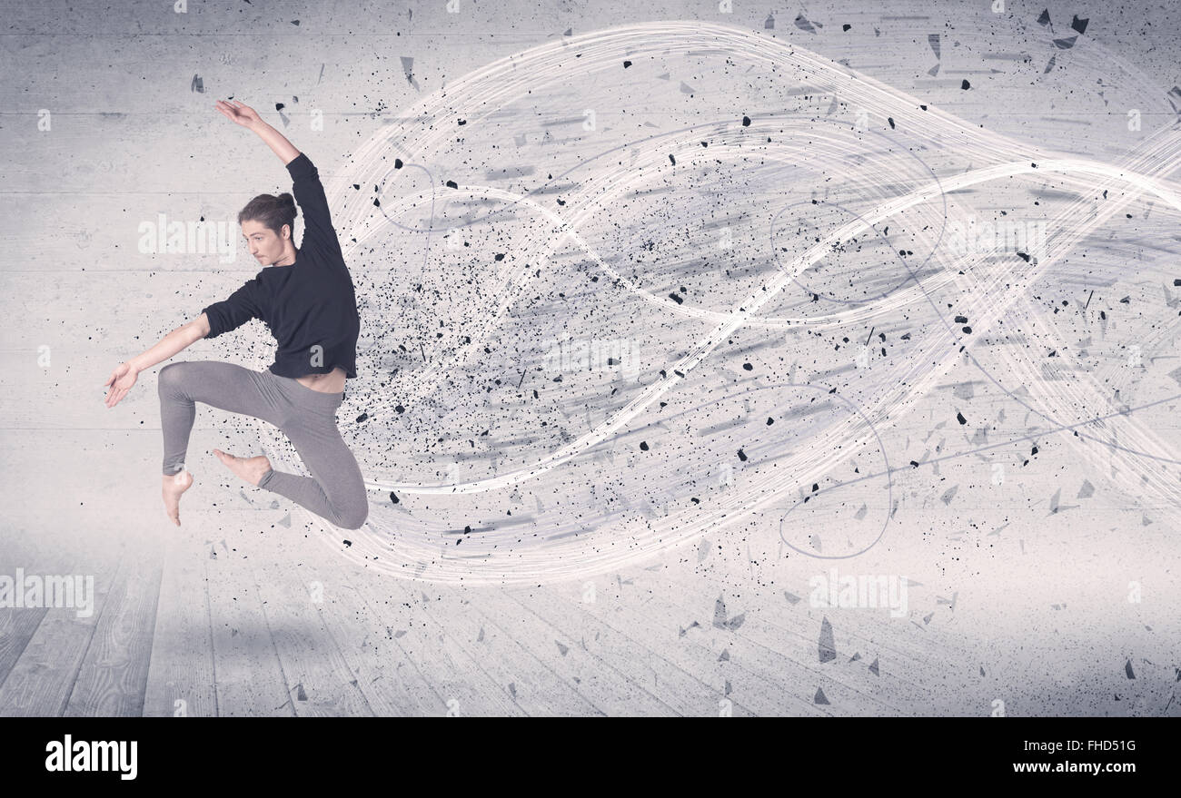 Performance ballet dancer jumping with energy explosion particles Stock ...