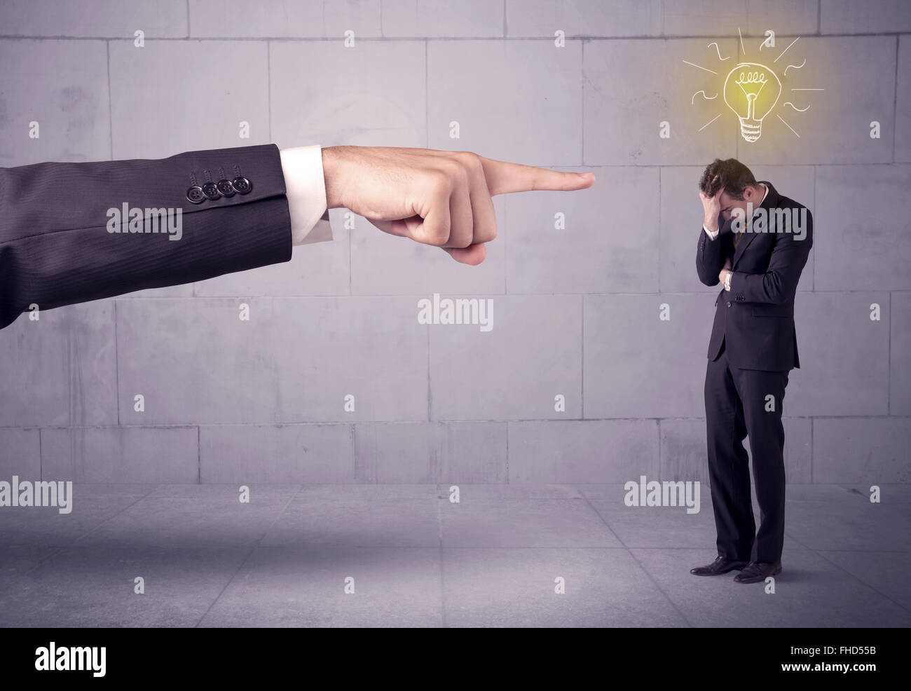 Boss blaming sales person with an idea Stock Photo - Alamy