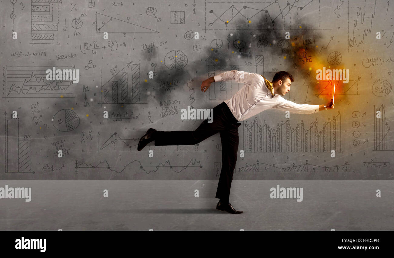 Running business man with fire laptop Stock Photo - Alamy
