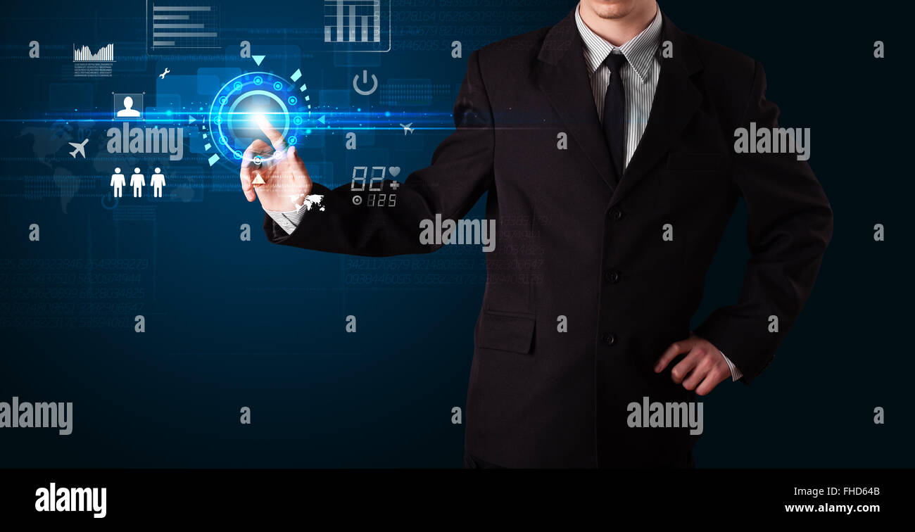Handsome businessman touching future web technology buttons and icons ...
