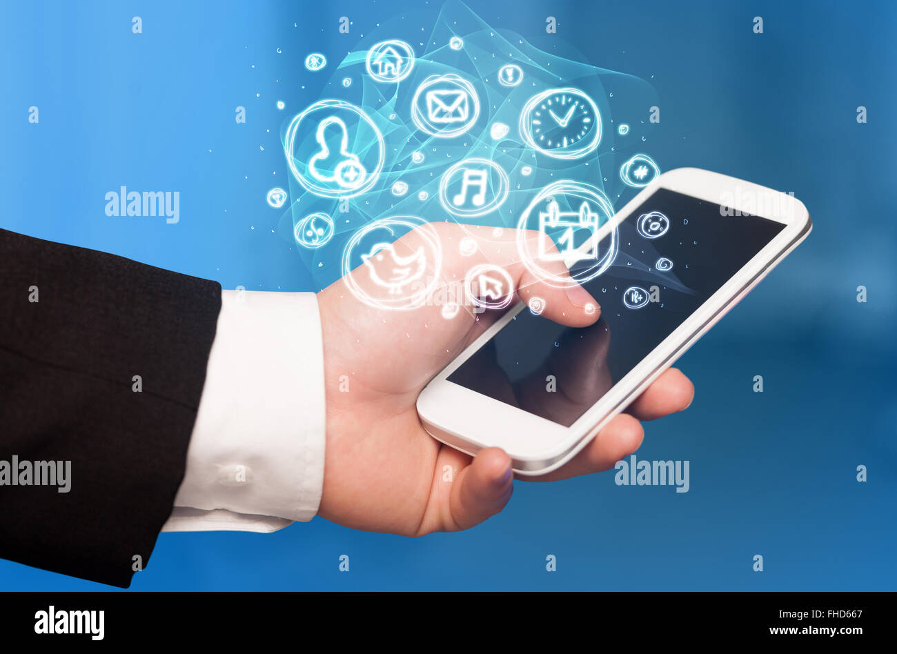 Hand holding smartphone with mobile app choices Stock Photo - Alamy