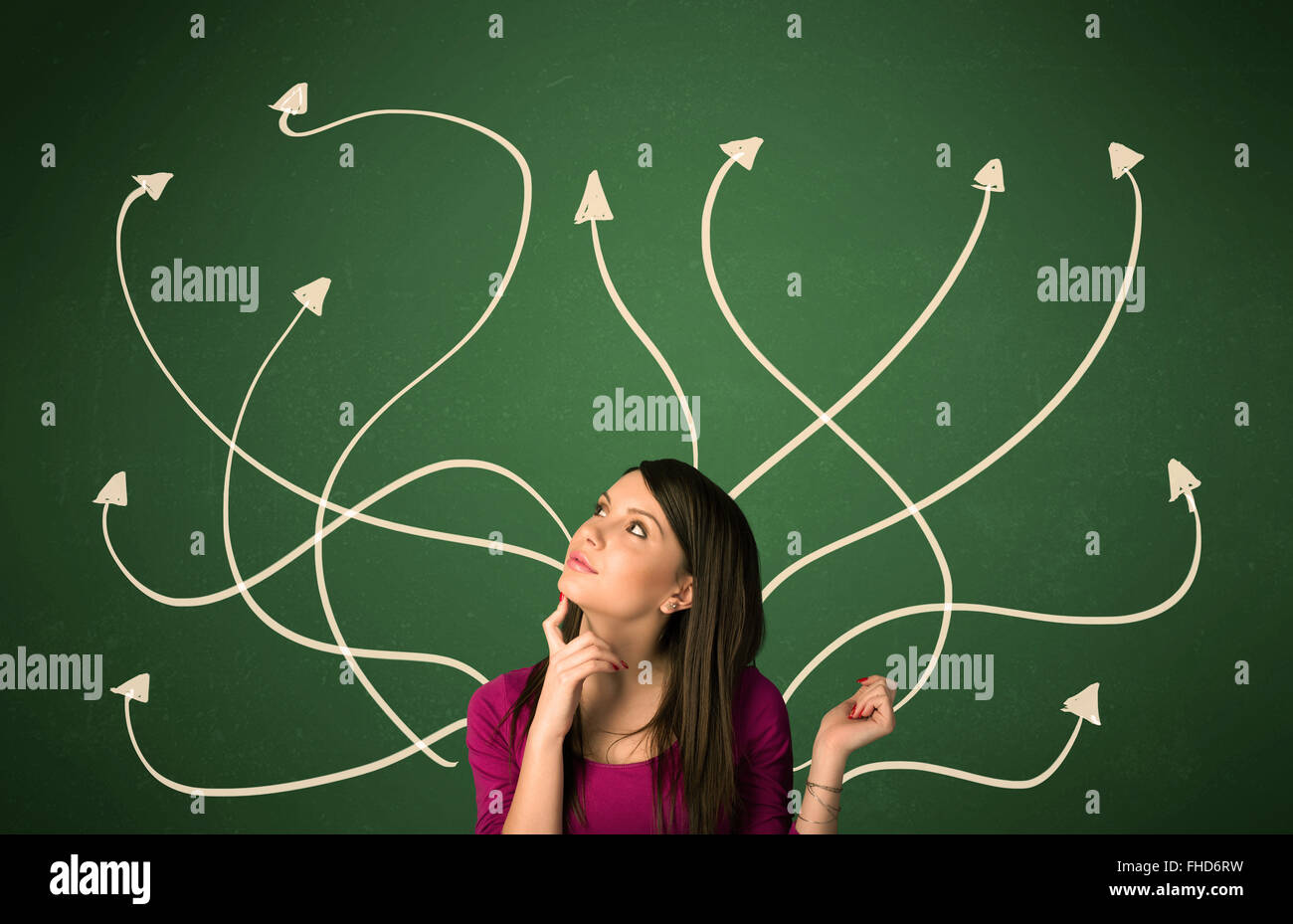 Beautiful girl thinking a solution Stock Photo - Alamy