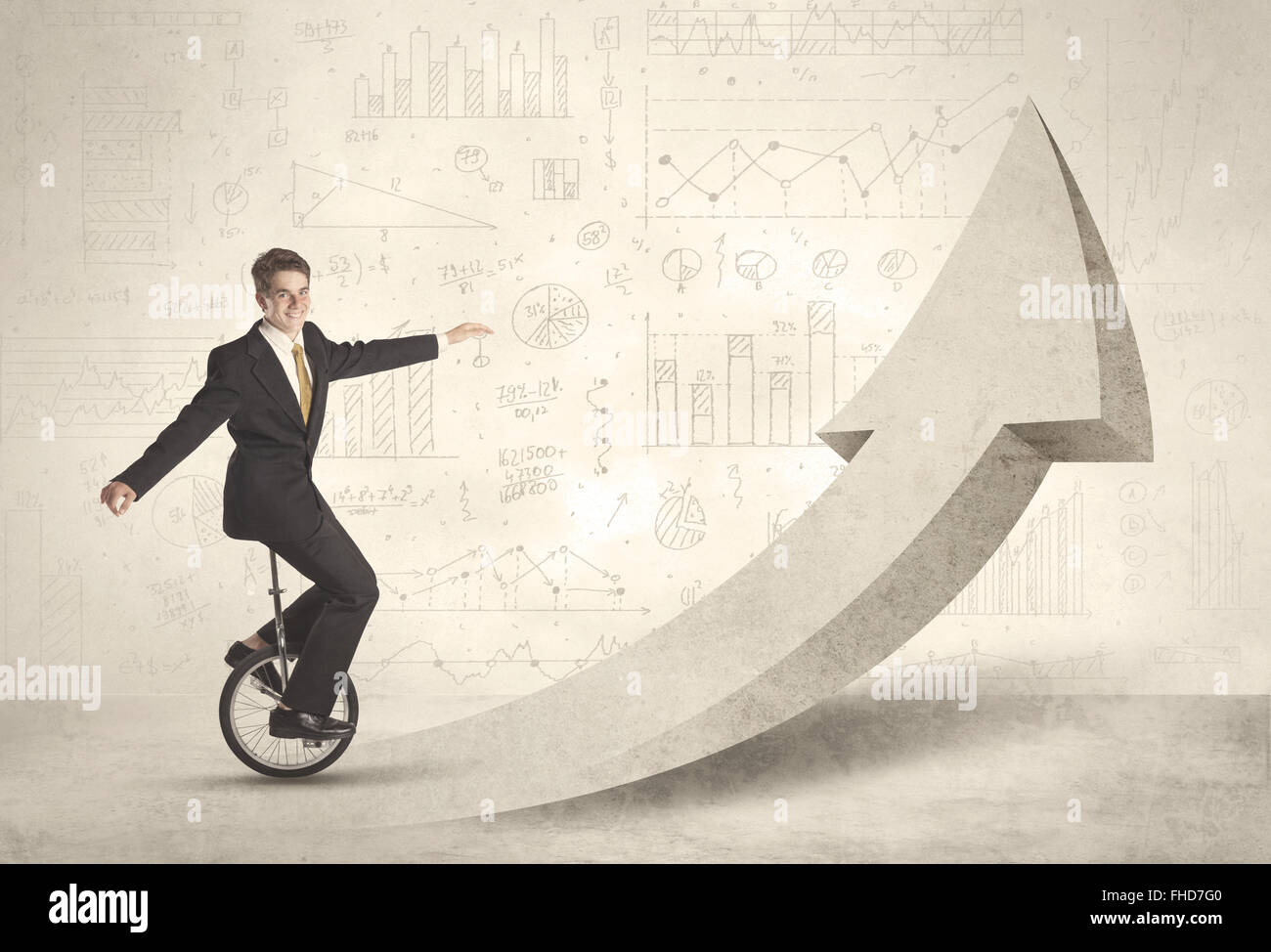 Happy business man riding a monocycle up on an arrow Stock Photo - Alamy