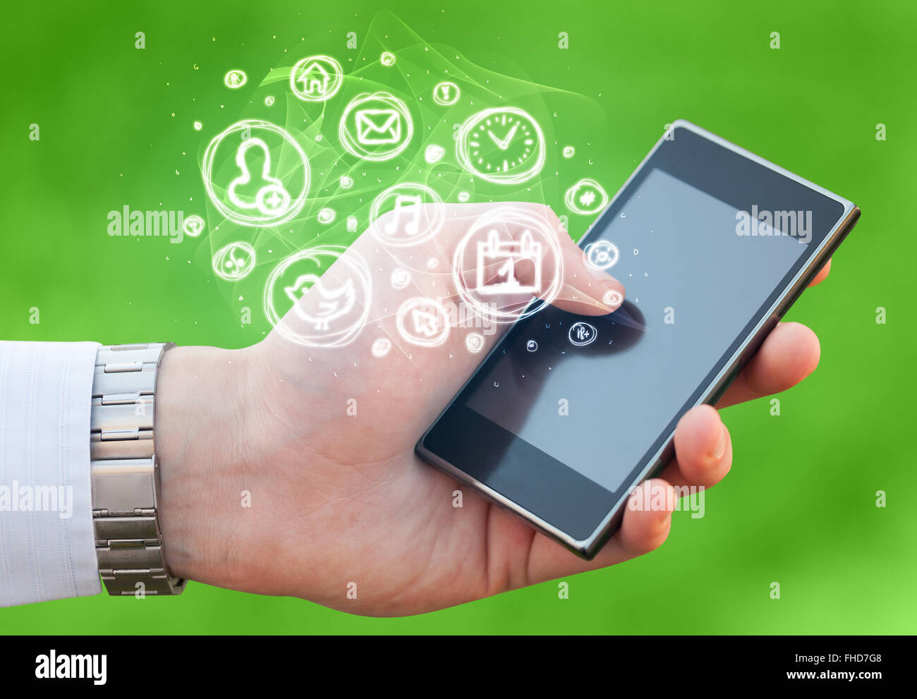 Hand holding smartphone with mobile app choices Stock Photo - Alamy