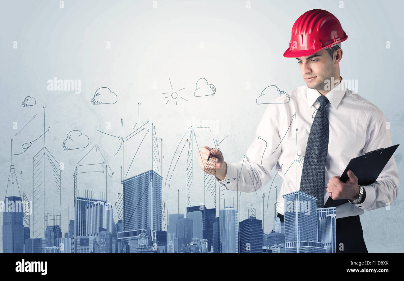 Young worker drawing a city sight Stock Photo - Alamy