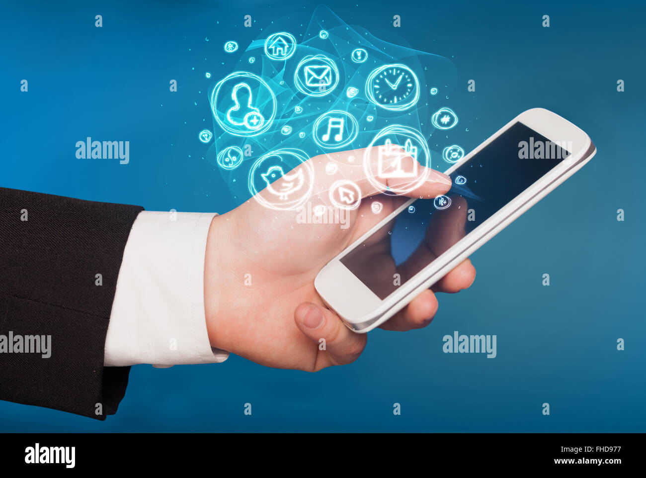 Hand holding smartphone with mobile app choices Stock Photo - Alamy