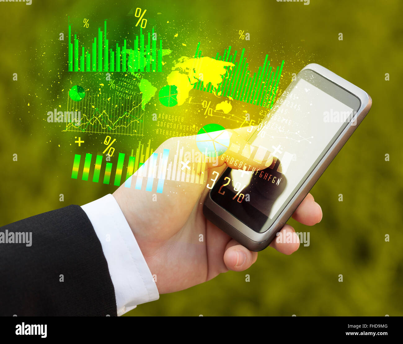 Hand holding smartphone with business diagrams Stock Photo - Alamy