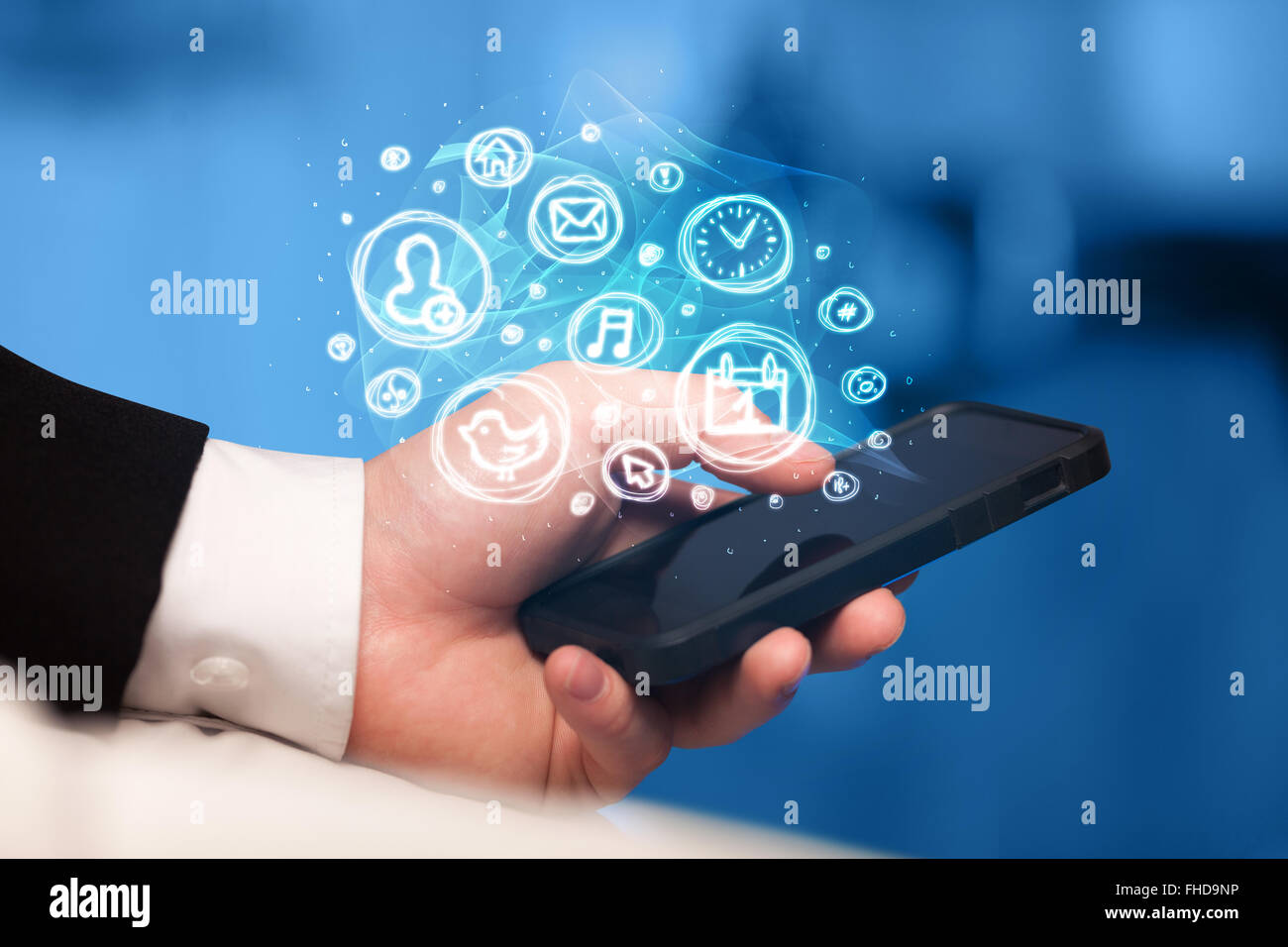 Hand holding smartphone with mobile app choices Stock Photo - Alamy