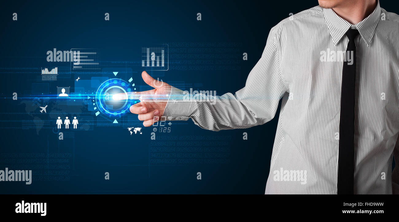 Handsome businessman touching future web technology buttons and icons ...