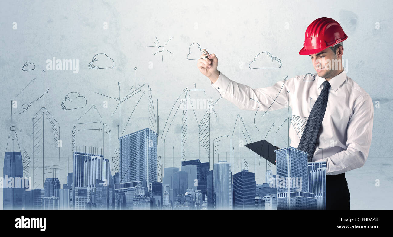 Young worker drawing a city sight Stock Photo - Alamy