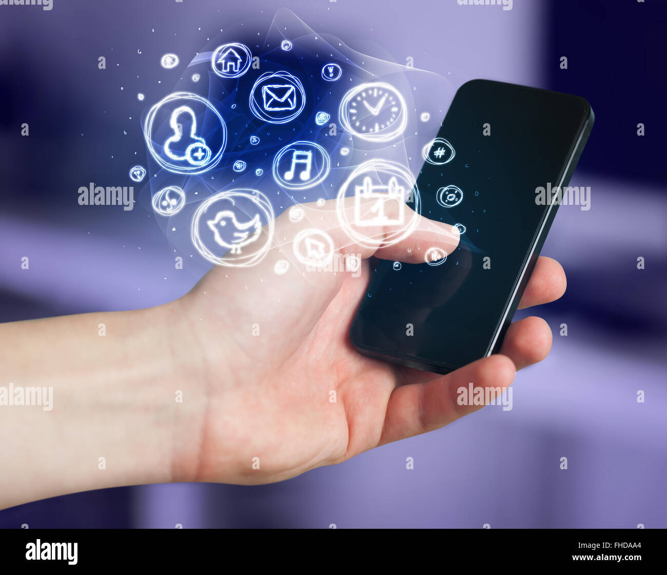 Hand holding smartphone with mobile app choices Stock Photo - Alamy