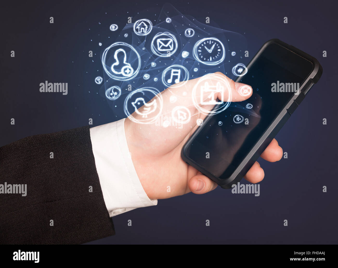 Hand holding smartphone with mobile app choices Stock Photo - Alamy