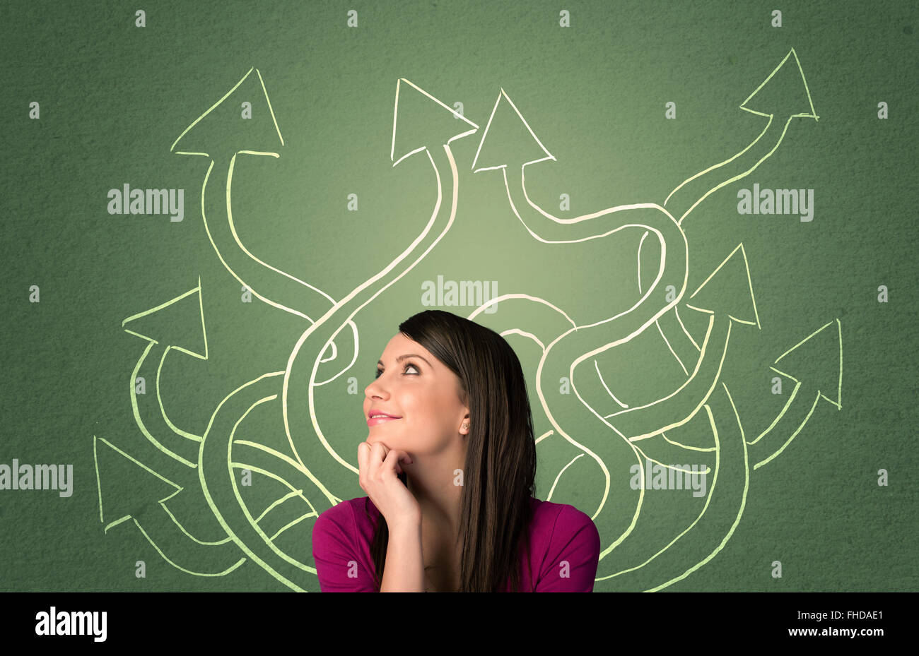 Beautiful girl thinking a solution Stock Photo - Alamy