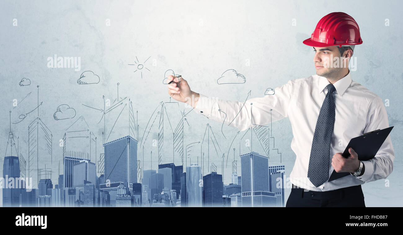 Young worker drawing a city sight Stock Photo - Alamy