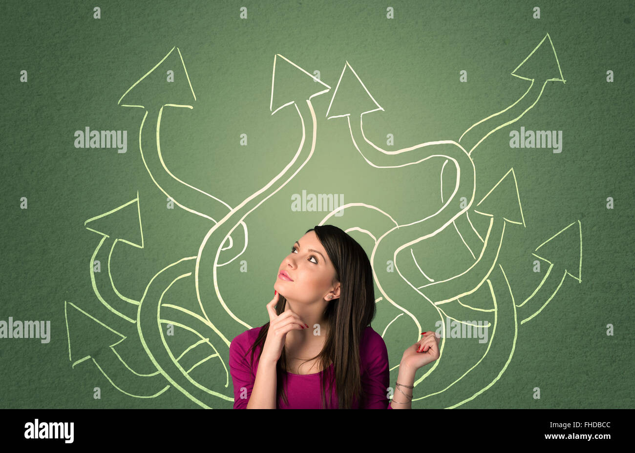 Beautiful girl thinking a solution Stock Photo - Alamy