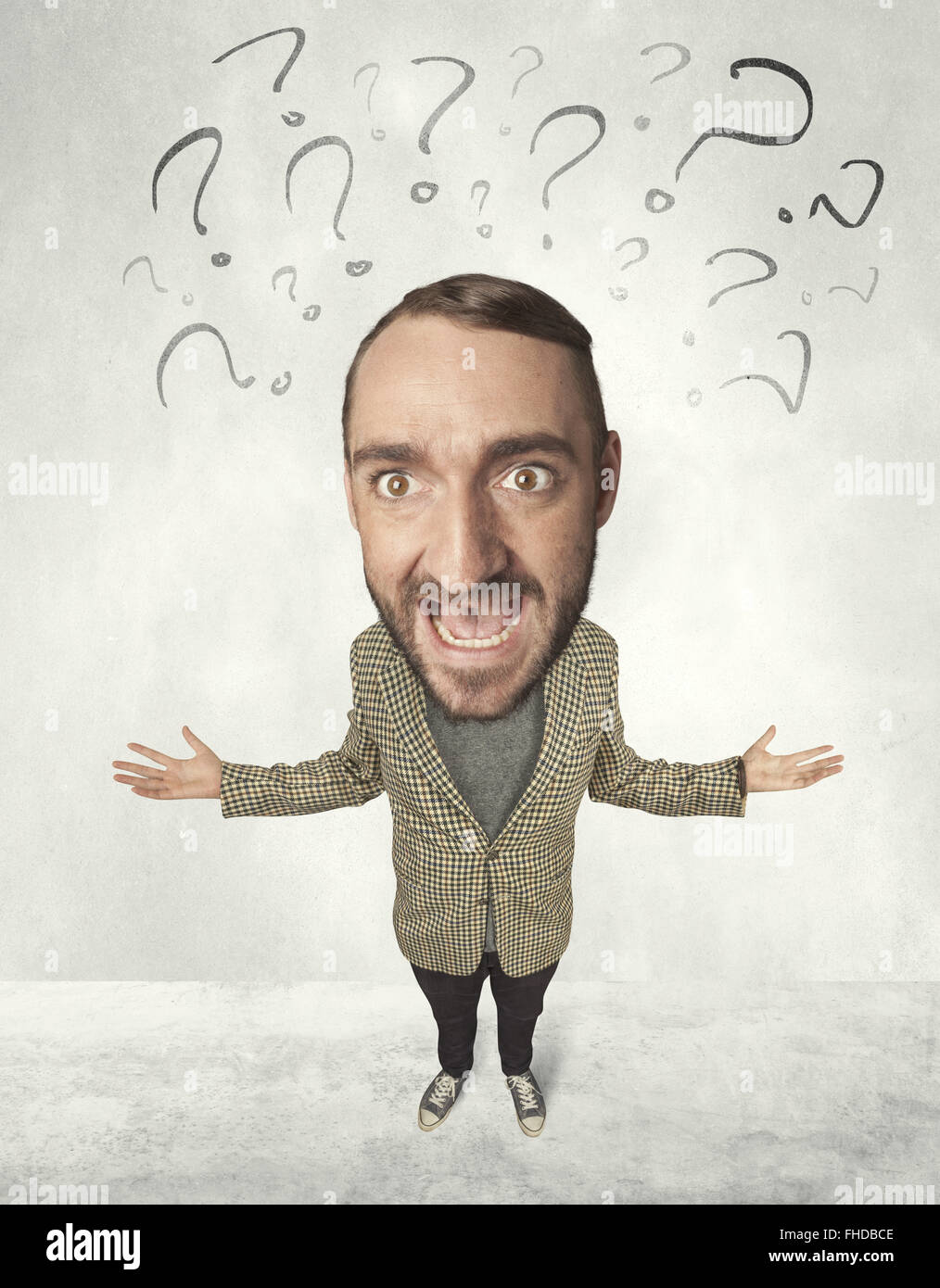 Big head person with question marks Stock Photo - Alamy