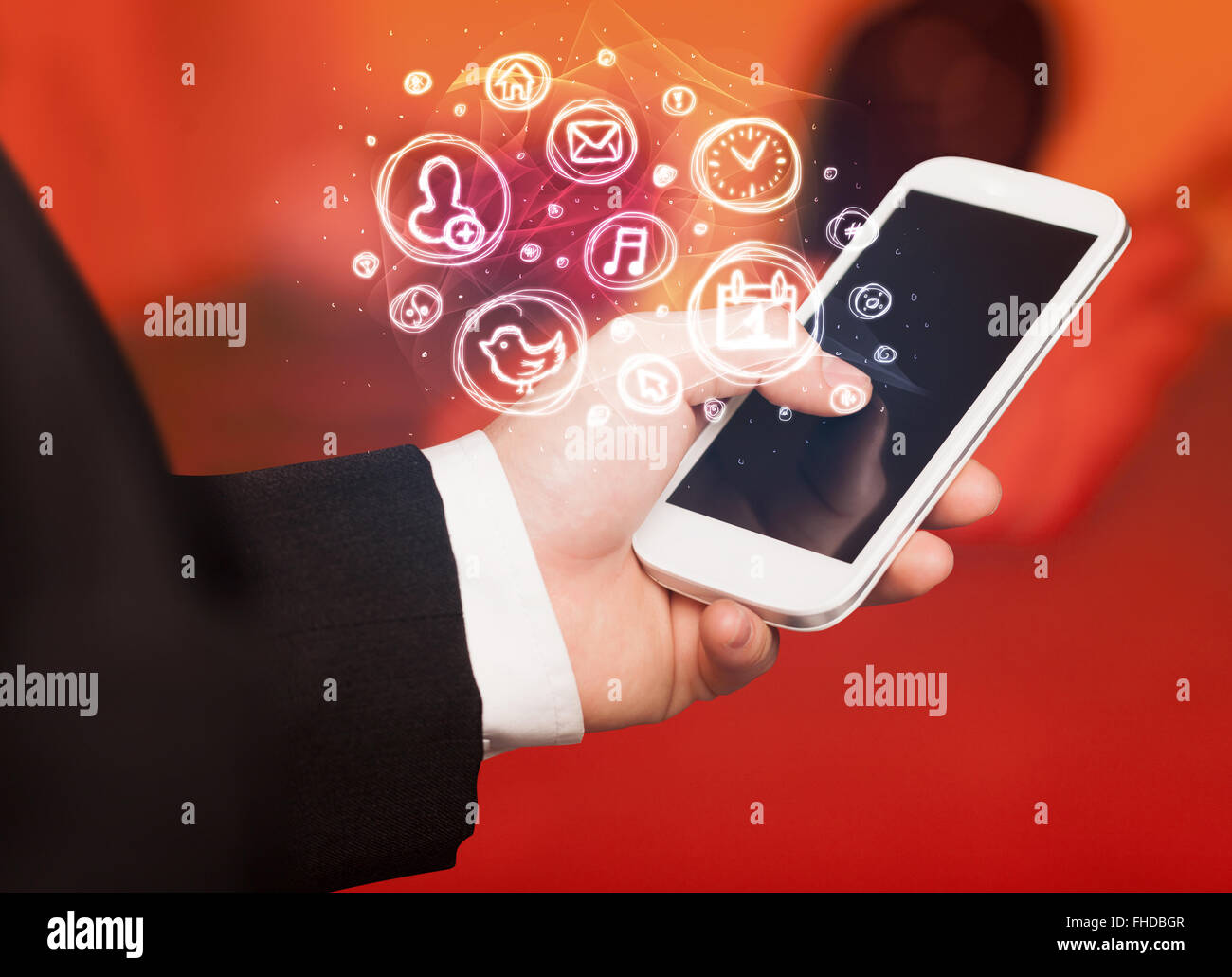 Hand holding smartphone with mobile app choices Stock Photo - Alamy