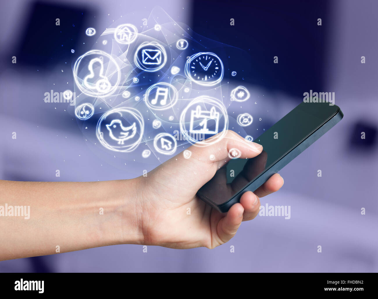 Hand holding smartphone with mobile app choices Stock Photo - Alamy