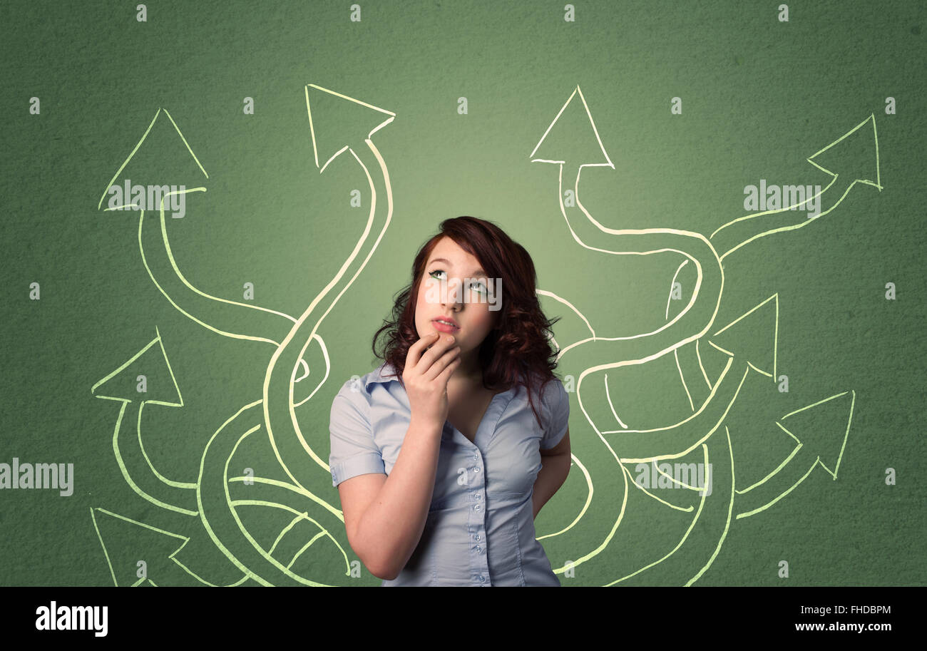 Beautiful girl thinking a solution Stock Photo - Alamy