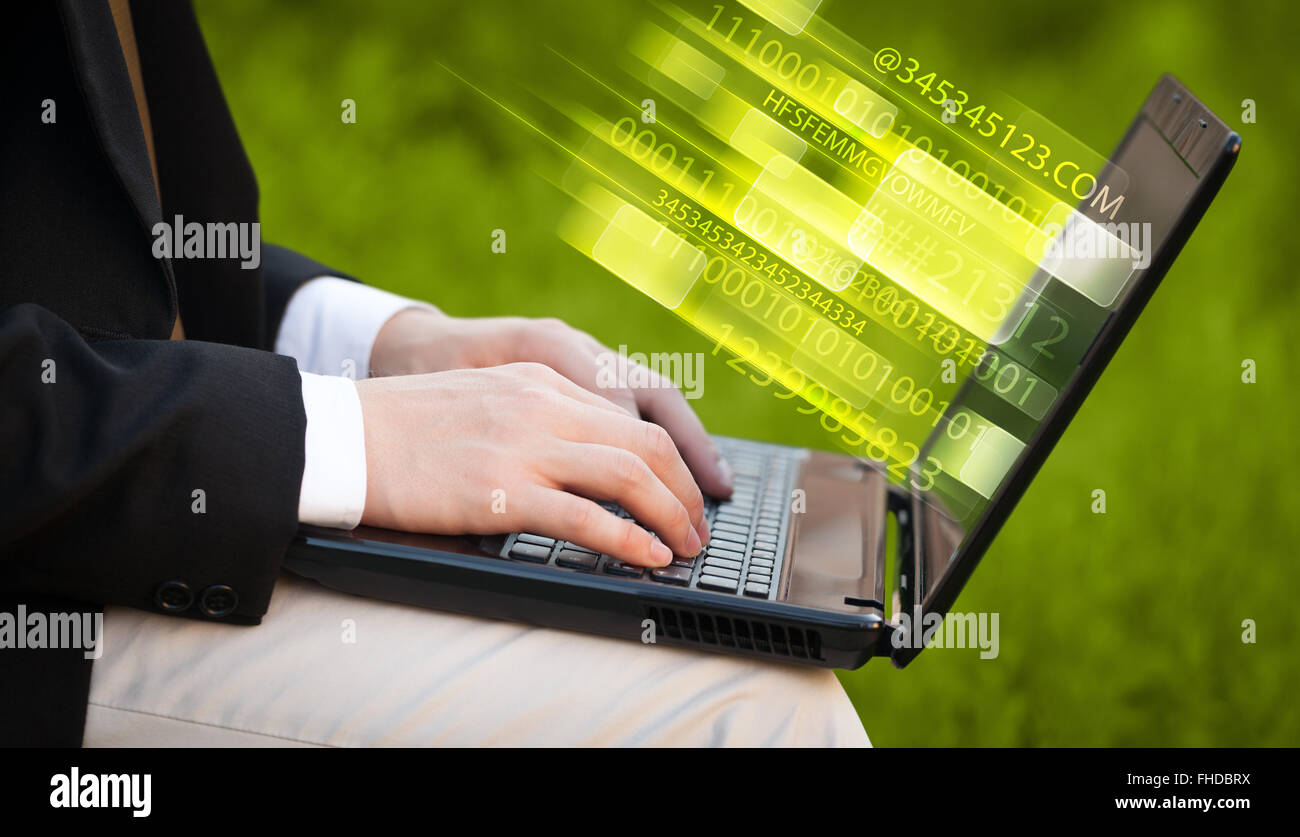 Close up of man typing on laptop computer Stock Photo - Alamy
