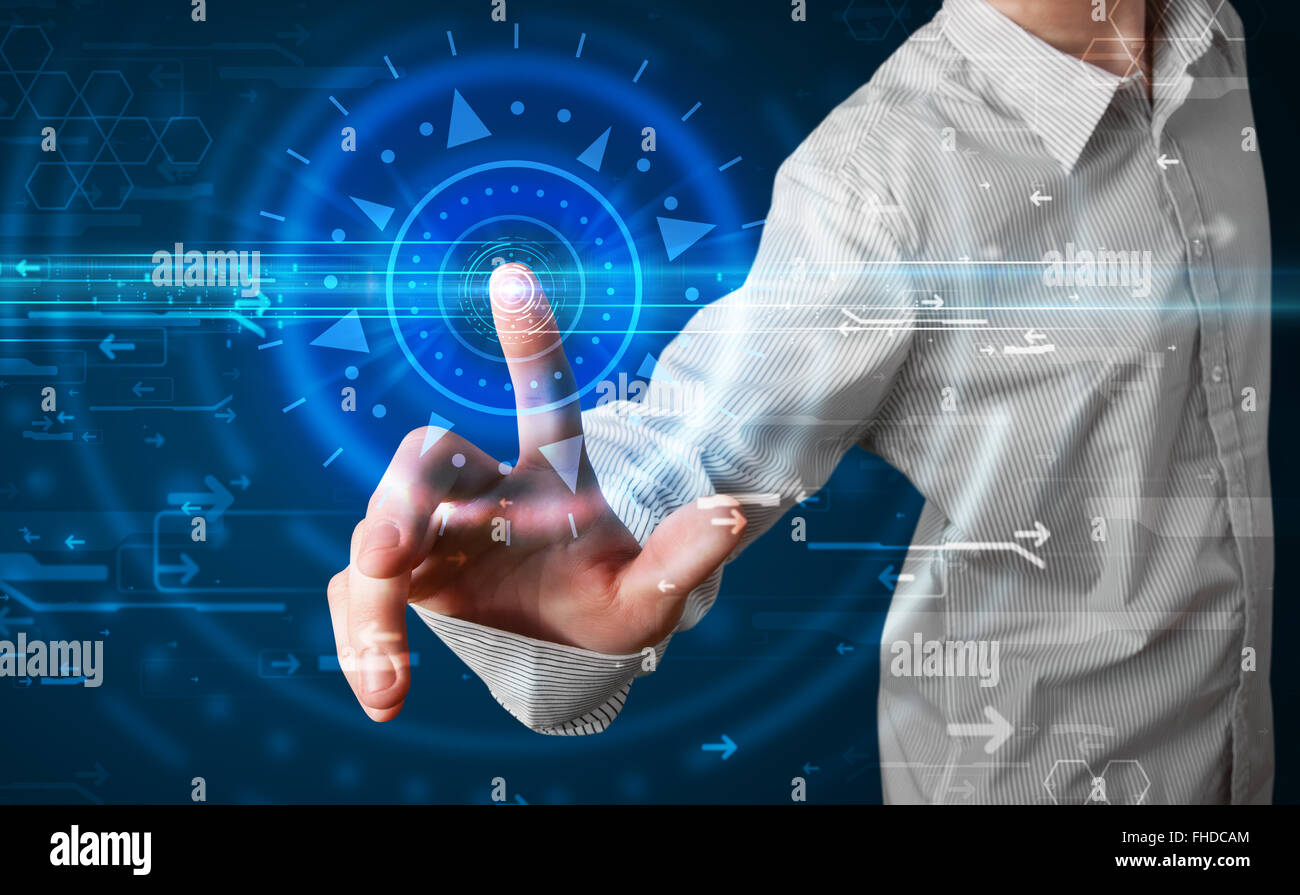 Handsome tech guy pressing high technology control panel screen concept ...