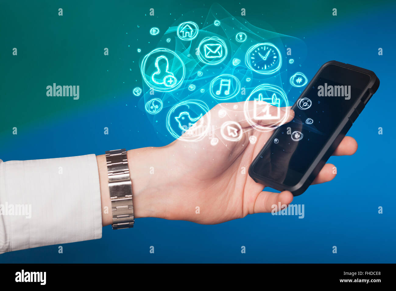 Hand holding smartphone with mobile app choices Stock Photo - Alamy