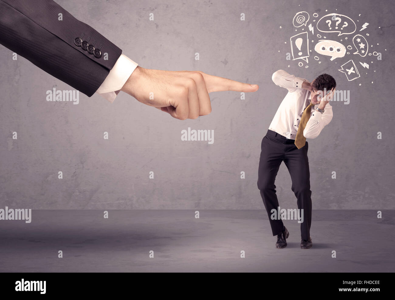 Boss hand pointing at confused employee Stock Photo - Alamy