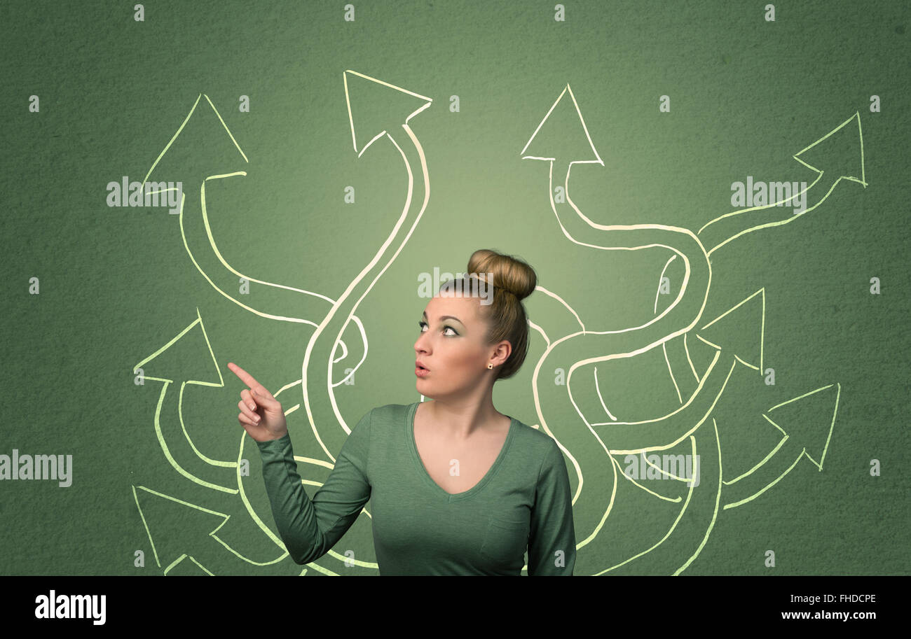 Beautiful girl thinking a solution Stock Photo - Alamy