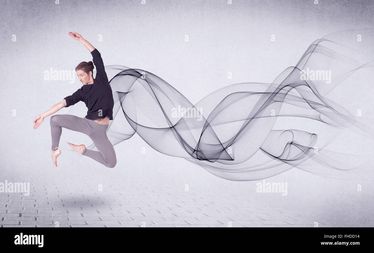 Modern ballet dancer performing with abstract swirl Stock Photo - Alamy