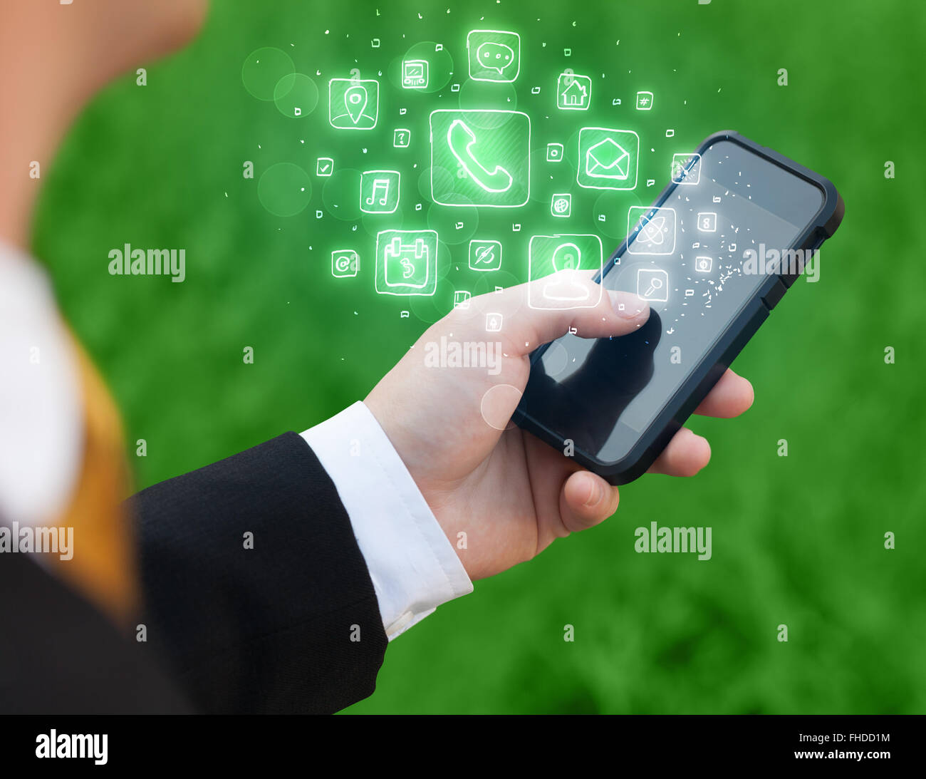 Hand holding smartphone with mobile app icons Stock Photo - Alamy