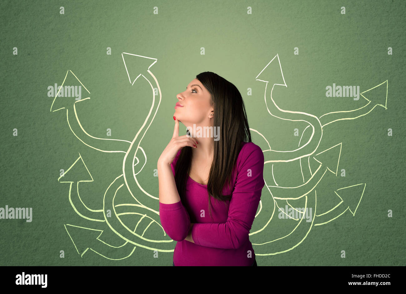 Beautiful girl thinking a solution Stock Photo - Alamy
