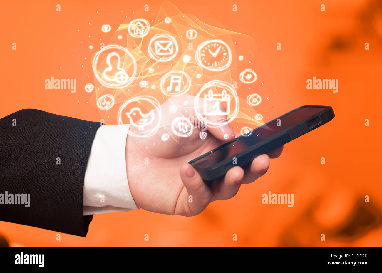 Hand holding smartphone with mobile app choices Stock Photo - Alamy