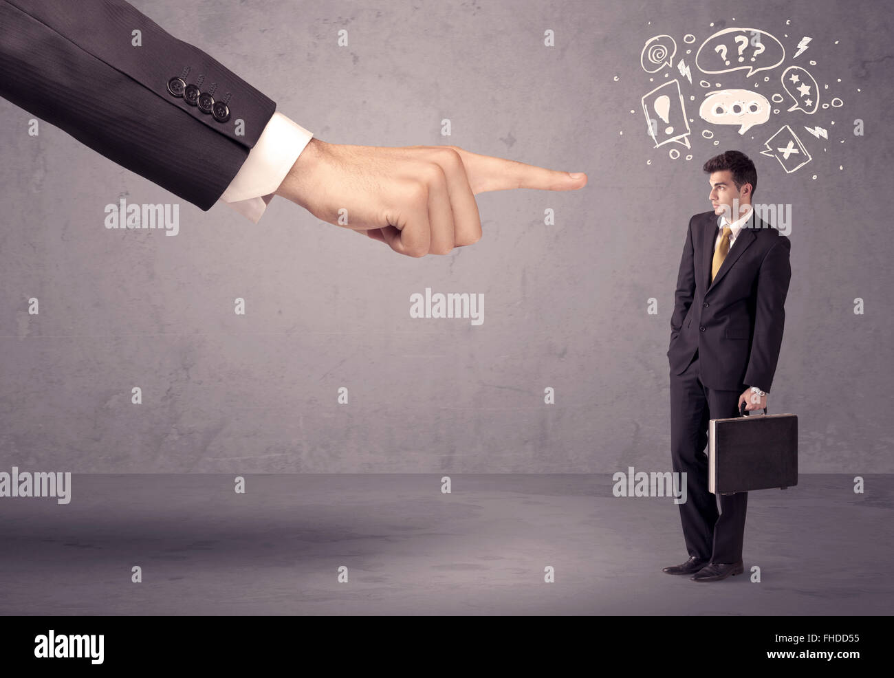 Boss hand pointing at confused employee Stock Photo - Alamy