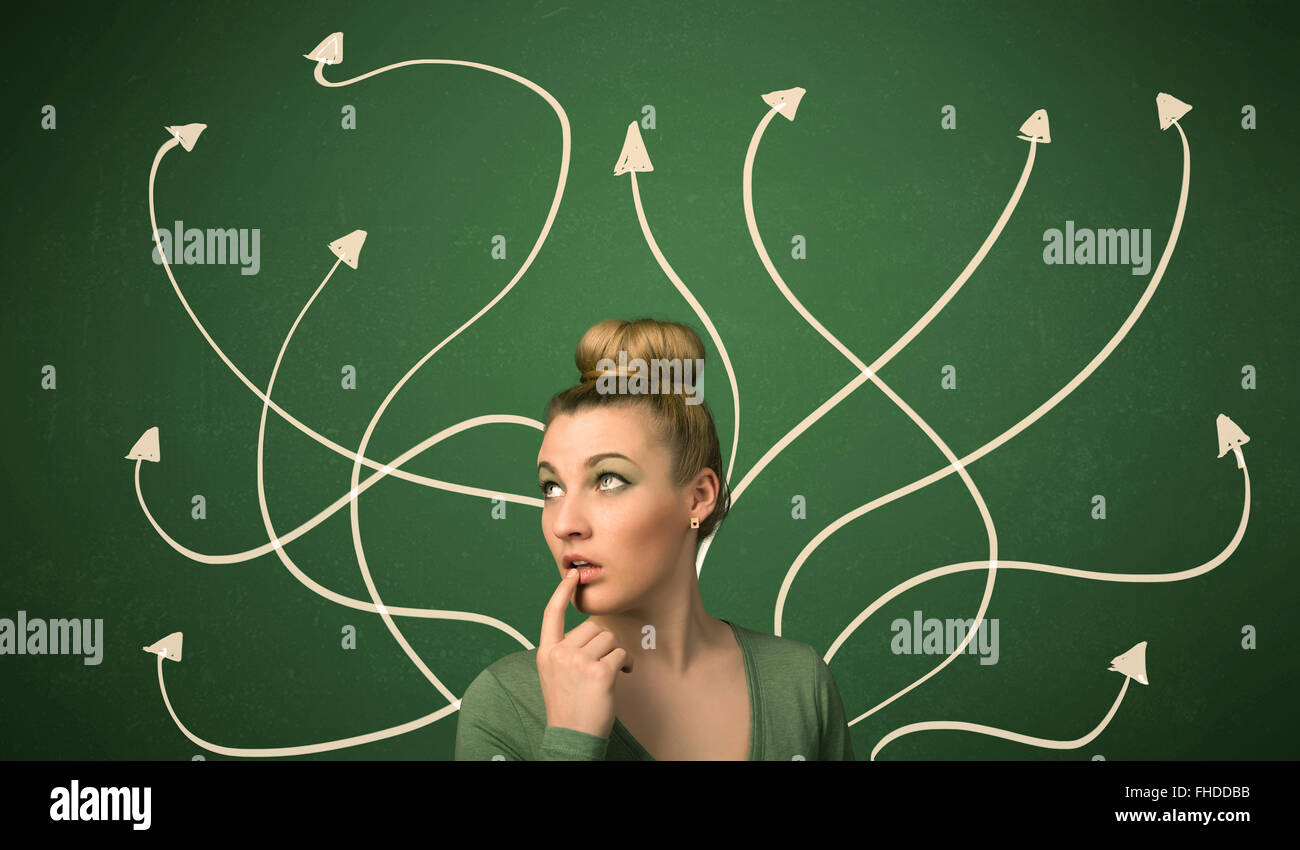 Beautiful girl thinking a solution Stock Photo - Alamy