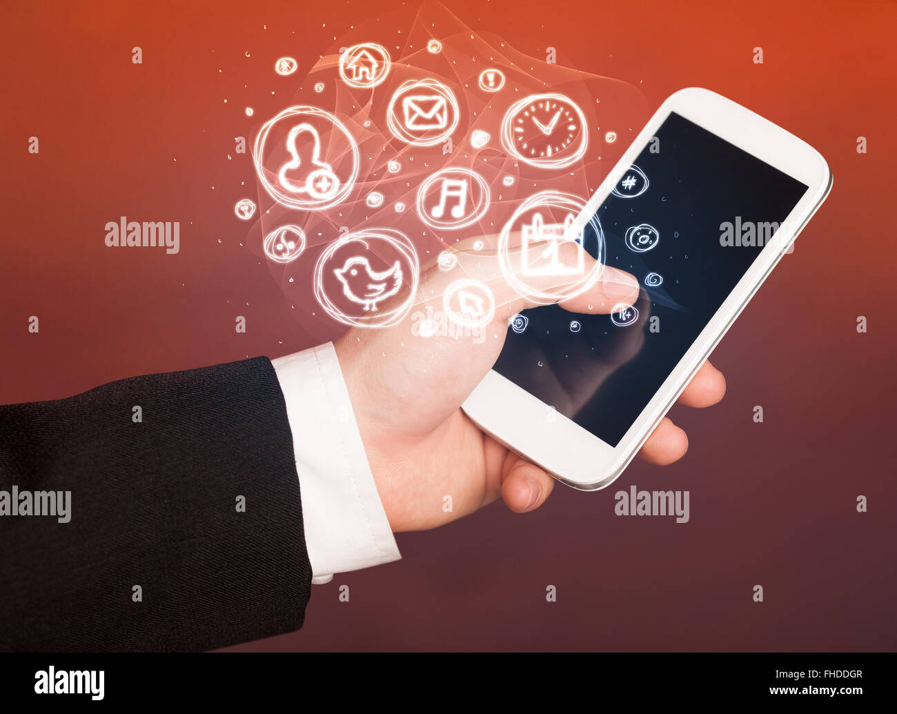 Hand holding smartphone with mobile app choices Stock Photo - Alamy