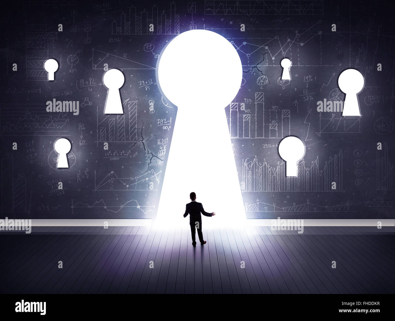 businessman looking through keyhole Stock Photo - Alamy