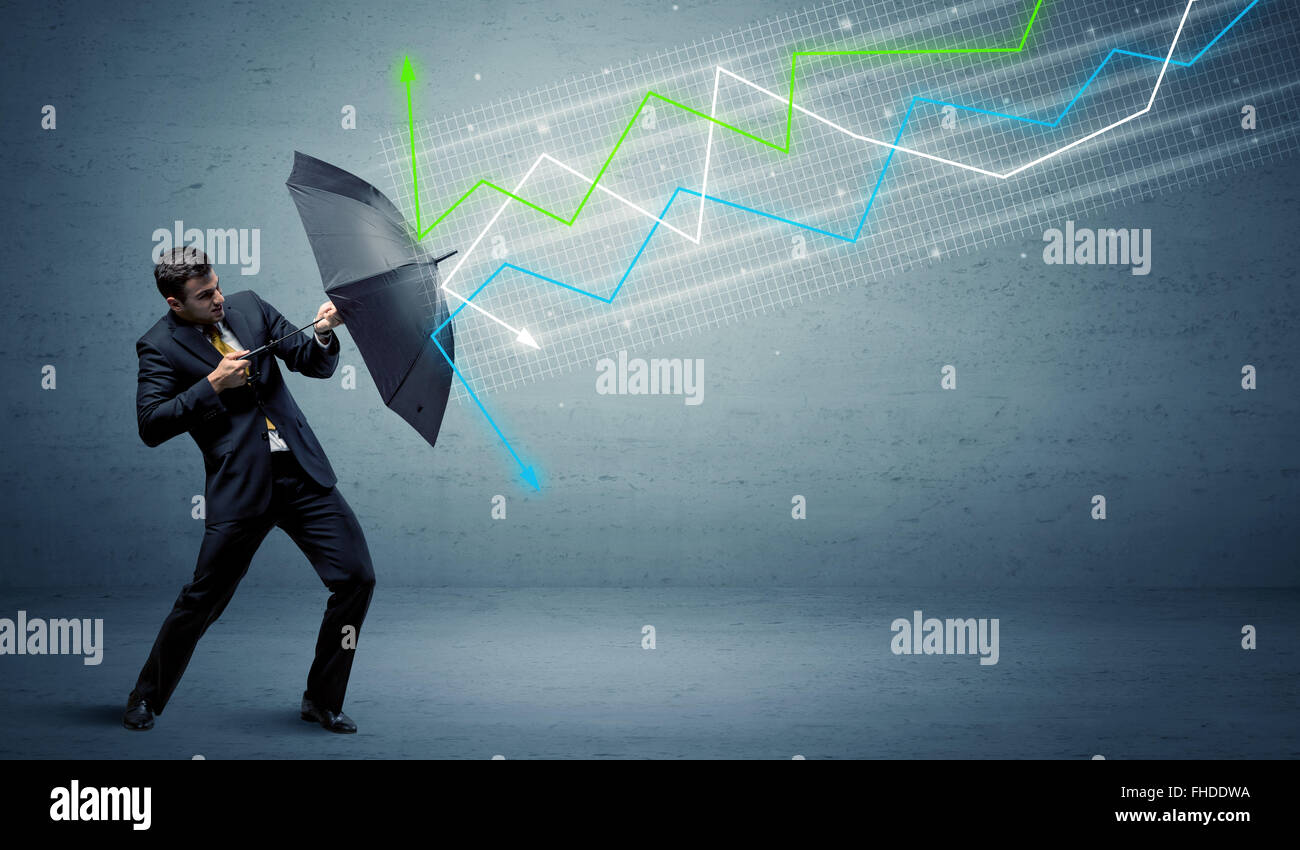 Business person with umbrella and stock market arrows concept Stock ...