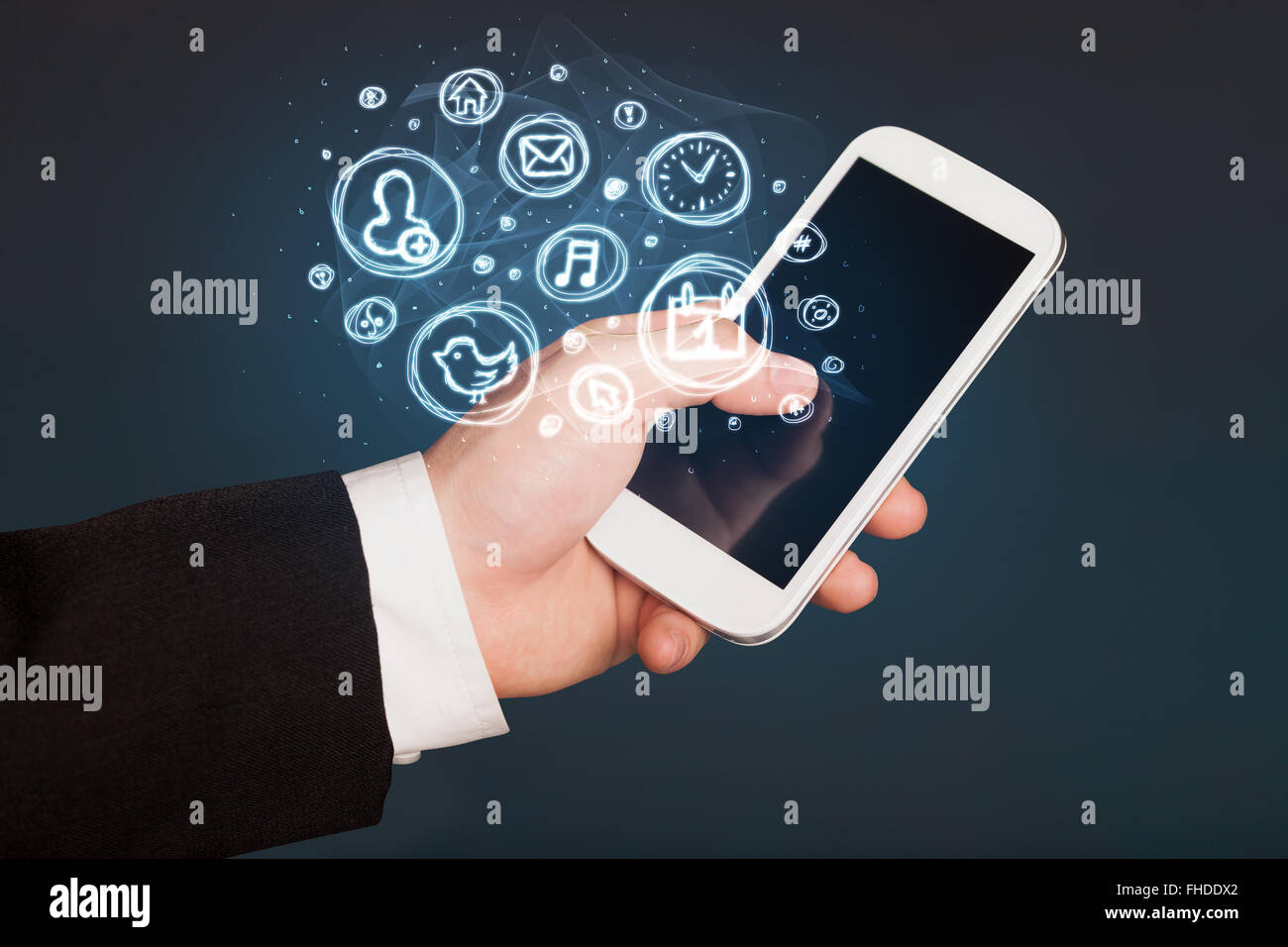 Hand holding smartphone with mobile app choices Stock Photo - Alamy