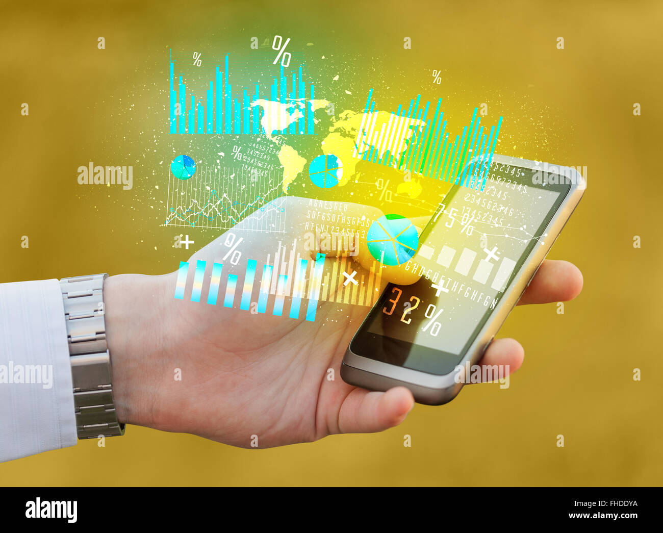 Hand holding smartphone with business diagrams Stock Photo - Alamy