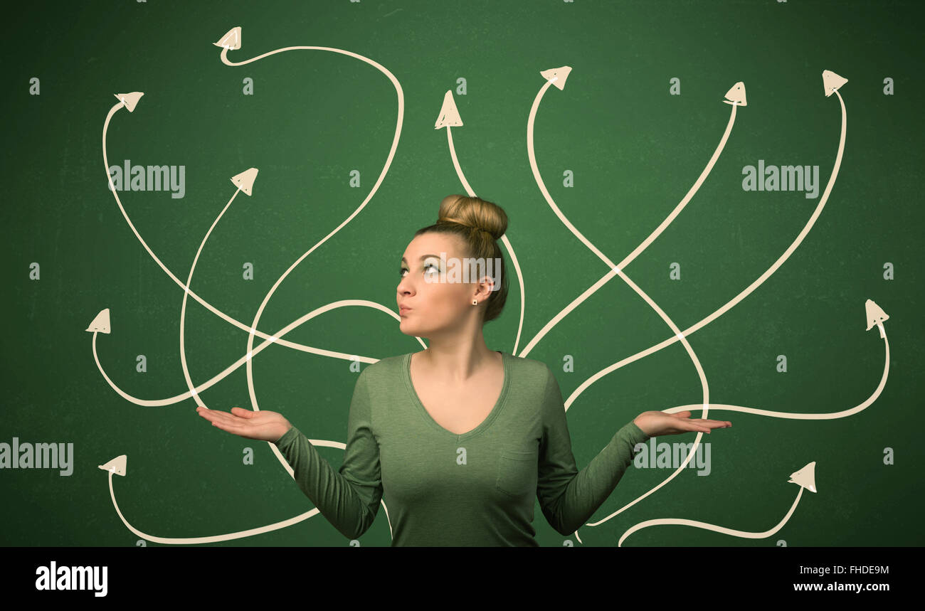 Beautiful girl thinking a solution Stock Photo - Alamy