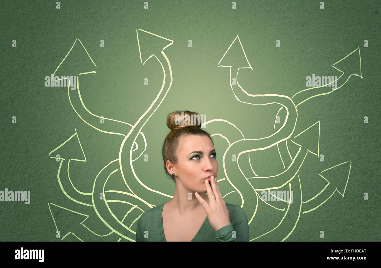 Beautiful girl thinking a solution Stock Photo - Alamy