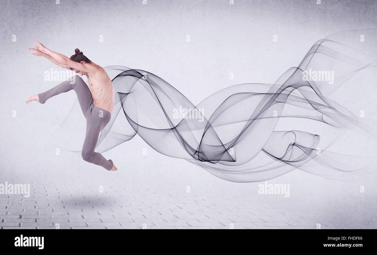 Modern ballet dancer performing with abstract swirl Stock Photo - Alamy