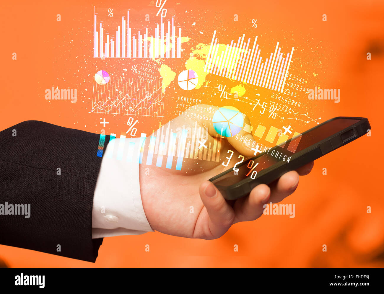 Hand holding smartphone with business diagrams Stock Photo - Alamy