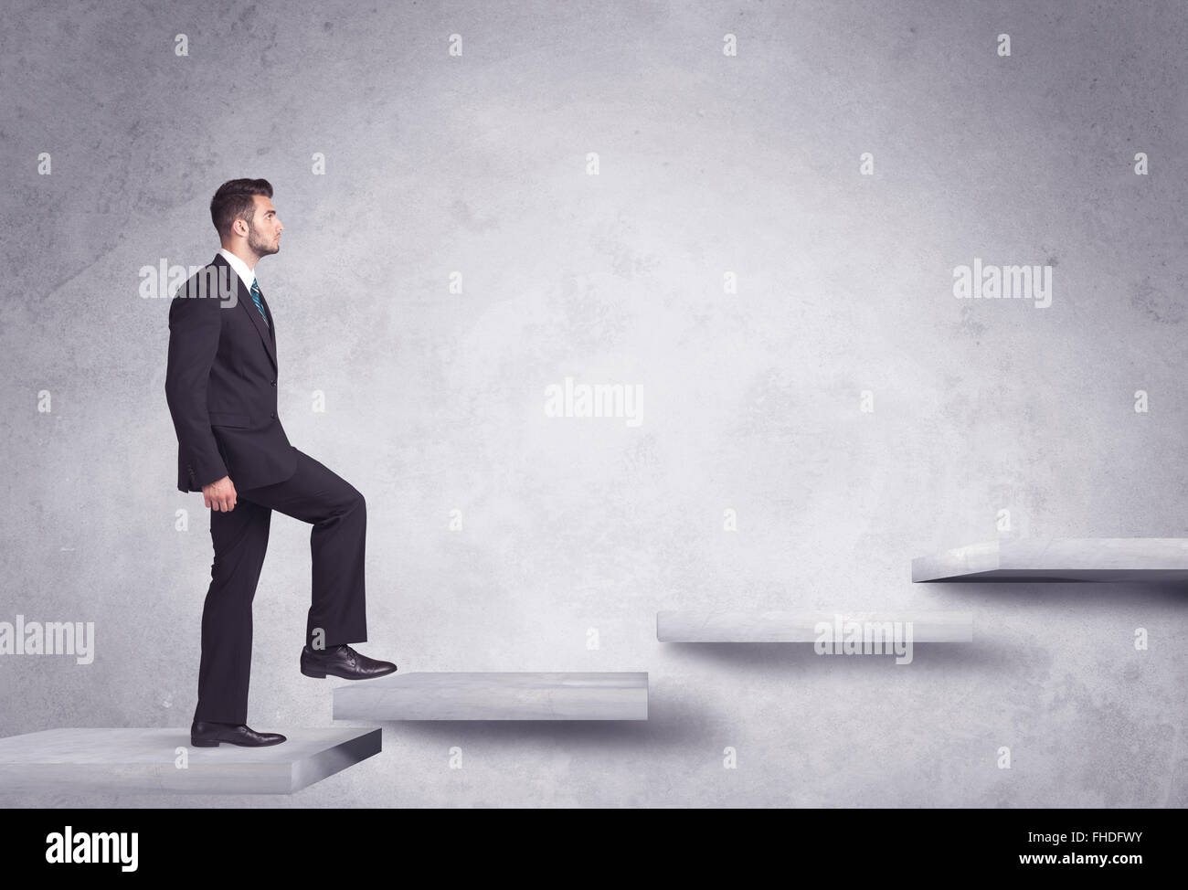 Stepping up a staircase Stock Photo - Alamy