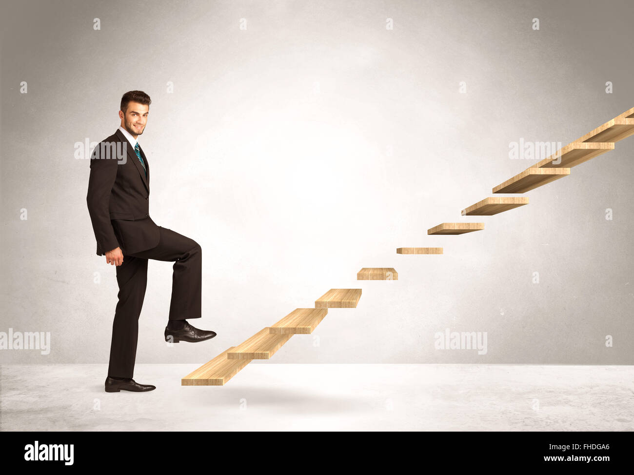 Stepping up a staircase Stock Photo - Alamy