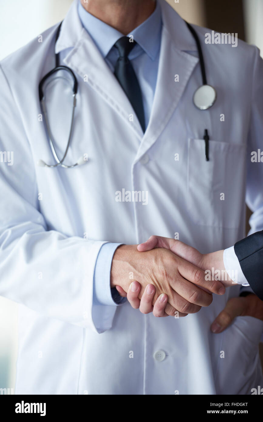 doctor handshake with a patient Stock Photo - Alamy