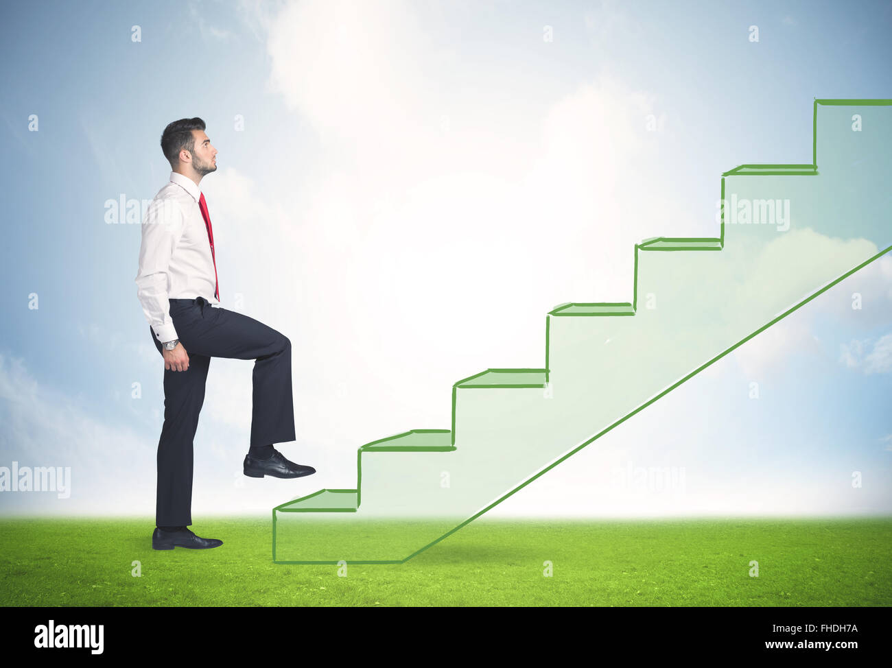 Stepping up a staircase Stock Photo - Alamy